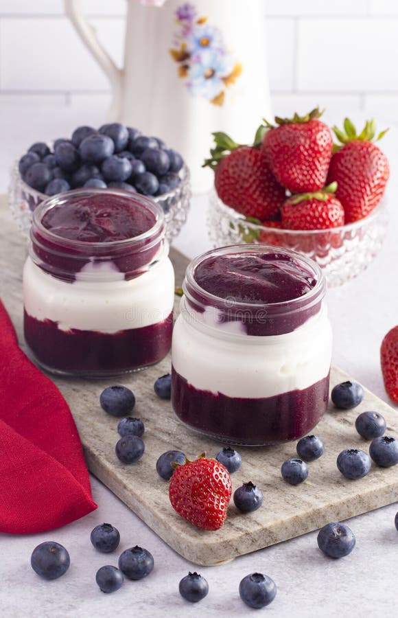 Yogurt and Berry Puree in a Glass Jar for Breakfast Stock Image - Image ...