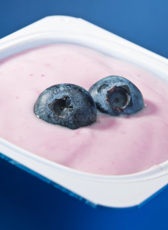 Yogurt with blueberry stock image. Image of plastic, blueberry - 16936203