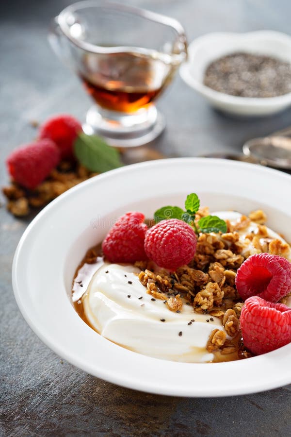 Yogurt Bowl with Raspberry and Maple Syrup Stock Photo - Image of bowl ...