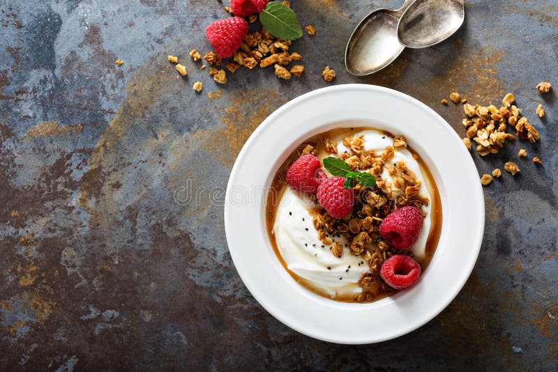 Yogurt Bowl with Raspberry and Maple Syrup Stock Photo - Image of ...
