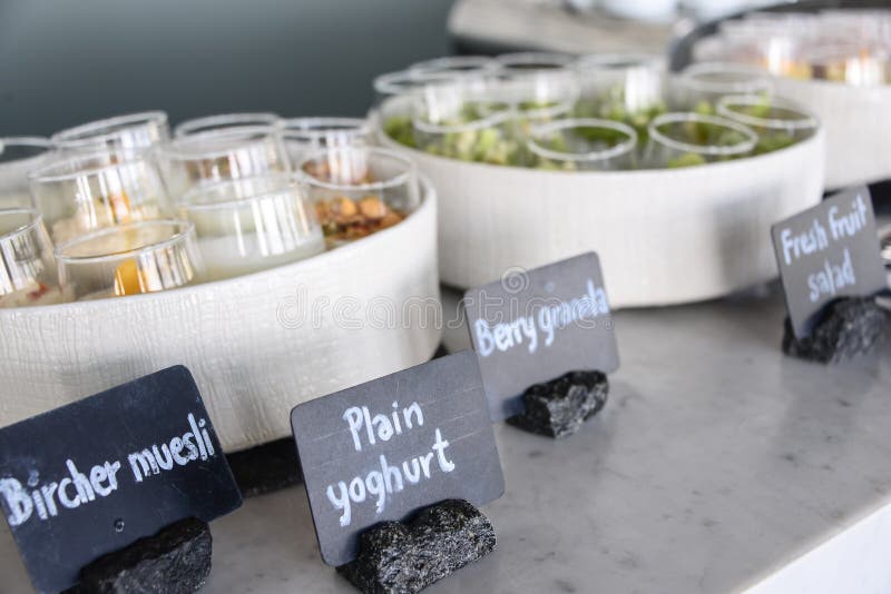 Yogurt on breakfast buffet stock photo. Image of brown - 69984614