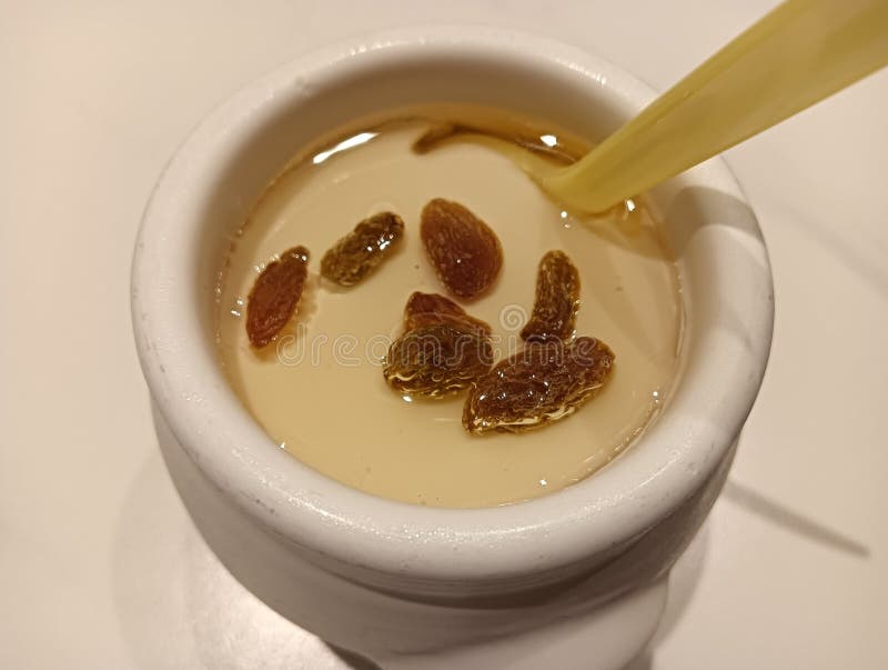 Yogurt Dried Raisin Honey in a Bowl with Spoon Inside Stock Photo ...