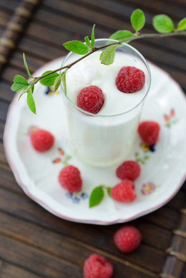 Yogurt and raspberry stock photo. Image of gourmet, dairy - 115507290