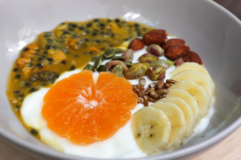 Yogurt with fruit topping stock image. Image of almond - 135850445