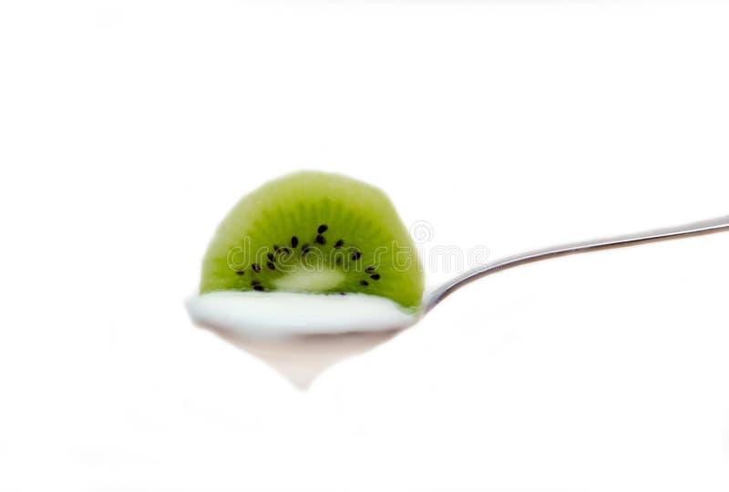 Yogurt with kiwi on spoon stock photo. Image of food - 50251432