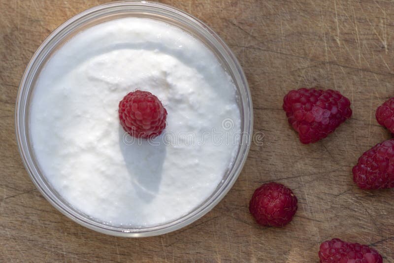 Yogurt with raspberries stock photo. Image of healthy - 76262530