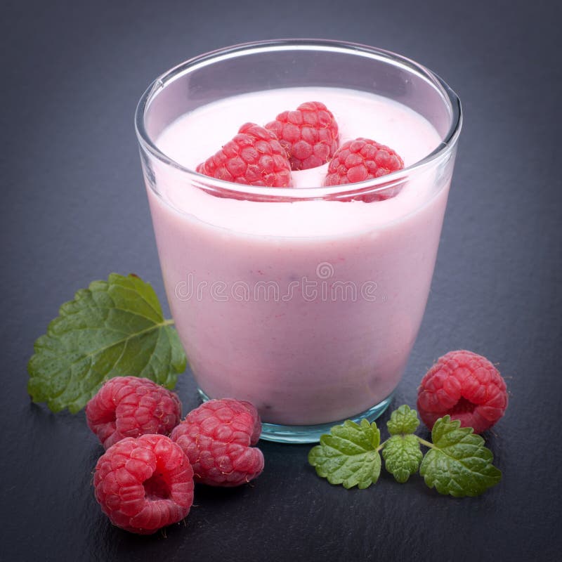Yogurt with raspberries stock image. Image of ingredients - 30421385