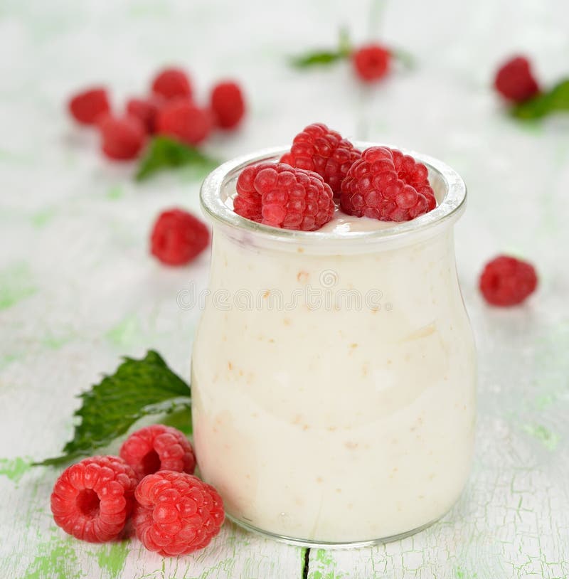 Yogurt with raspberries stock photo. Image of portion - 31494366