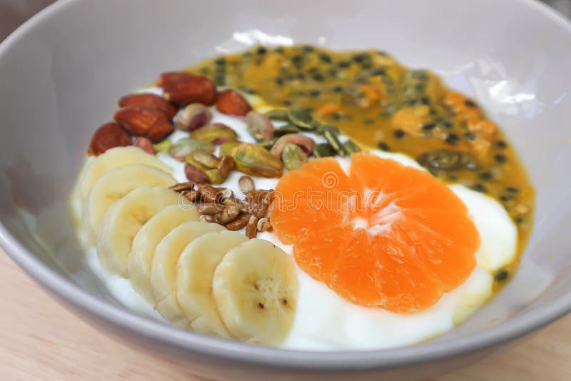 Yogurt with fruit topping stock image. Image of passion - 135792913