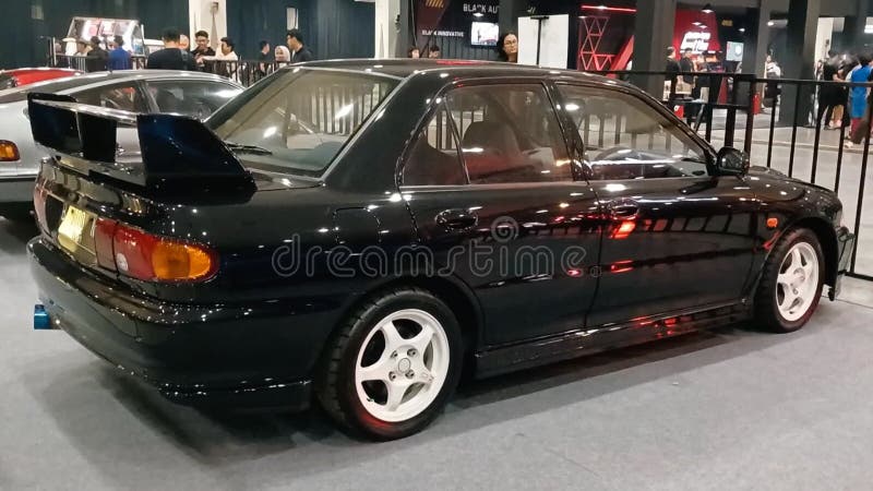 Black Mitsubishi Lancer Evolution III in Black Auto Battle Yogyakarta ...