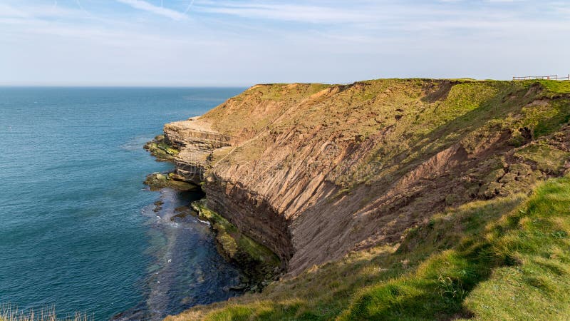 Filey Brigg Cliffs and Rock Pools Stock Photo - Image of ocean, force ...