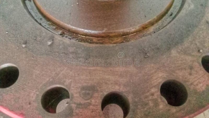 You Can See a Round Plate Whose Edges Have Been Drilled Around the ...