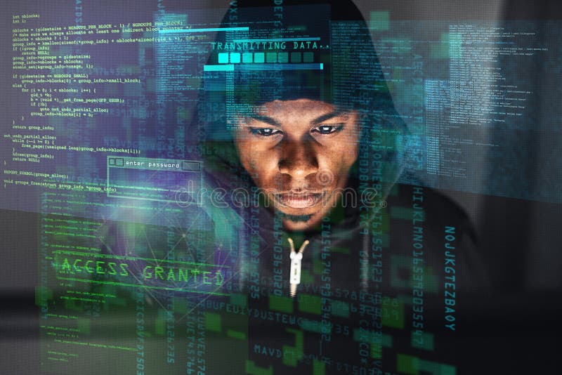 You Could Be His Next Victim. Shot of a Hacker Cracking into a Network in the Dark. Stock Photo ...