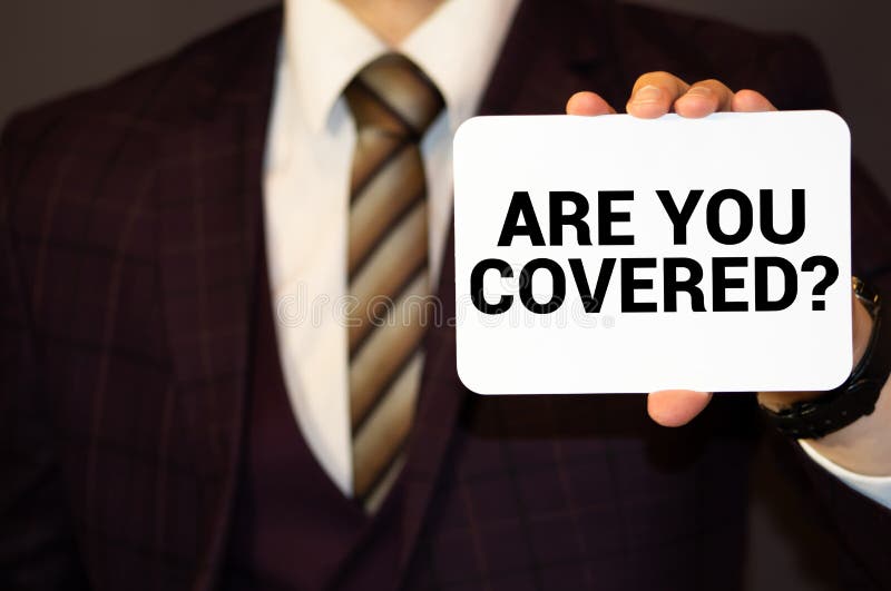 Are You Covered. Man Holding a Card with a Message Text Written Stock ...