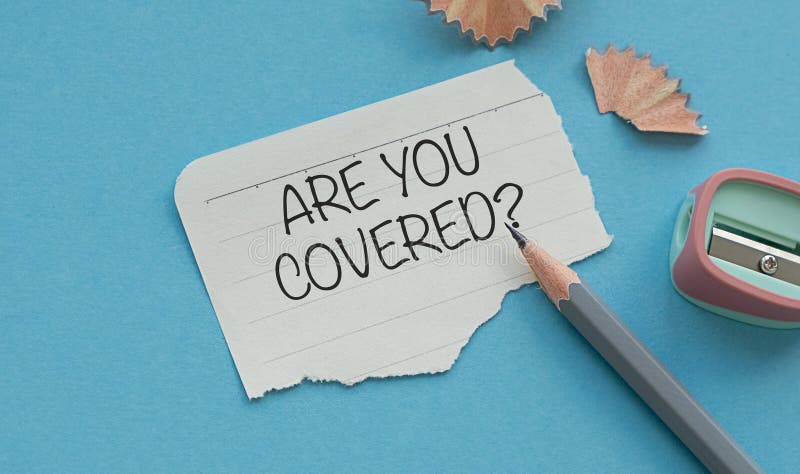 Are YOU COVERED Text Written on Paper Notebook with Pencil on Blue ...