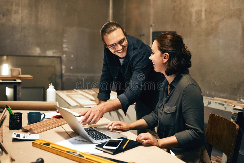 So You Created this Design. Two Cheerful Young Carpenters Working on a ...