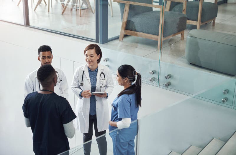 You Did so Well on that Assignment. a Group of Young Doctors and Nurses ...