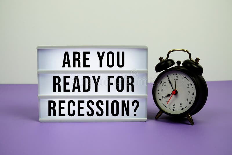 Are You Ready for Recession? Text on Light Box with Alarm Clock on ...
