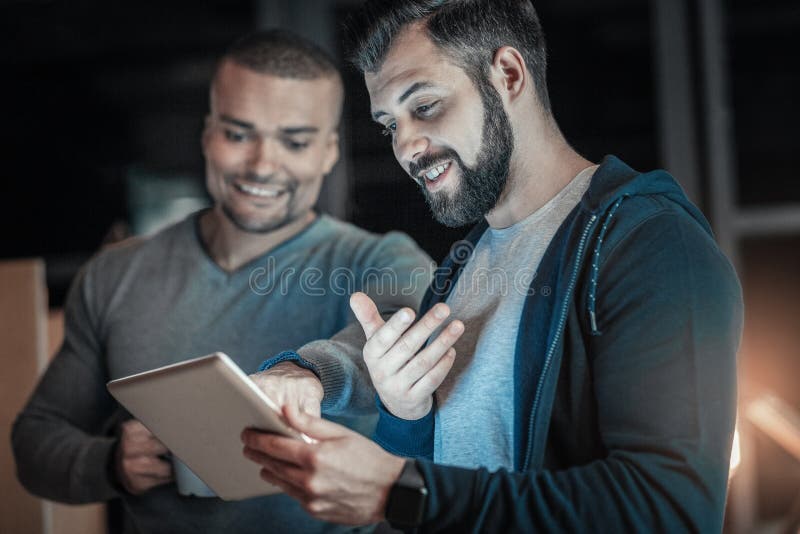 Optimistic Two Colleagues Chatting about Code Stock Image - Image of ...