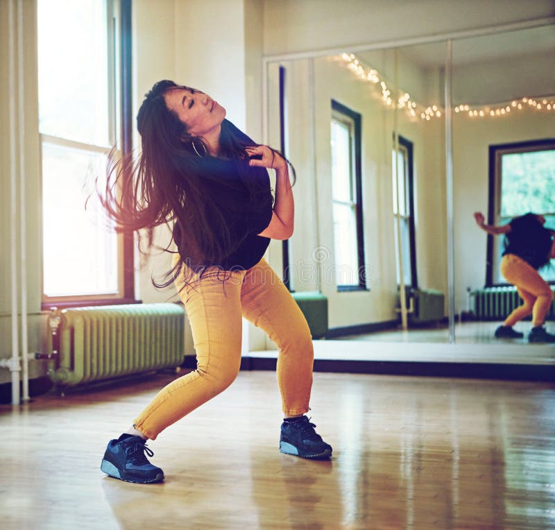 You are What You Dance. a Young Woman Dancing in a Studio. Stock Photo ...