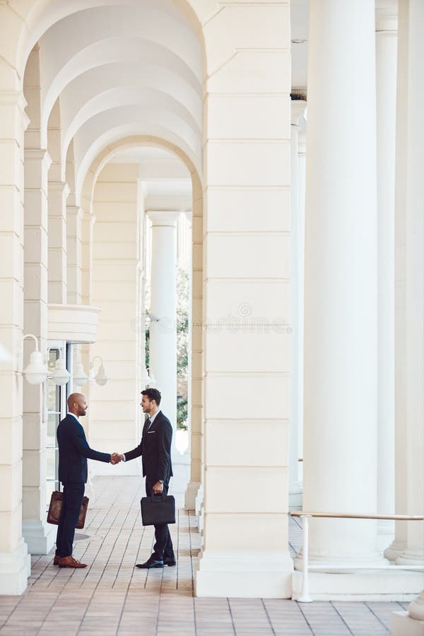 When You Win, I Win. Two Businessmen Shaking Hands in the City. Stock ...