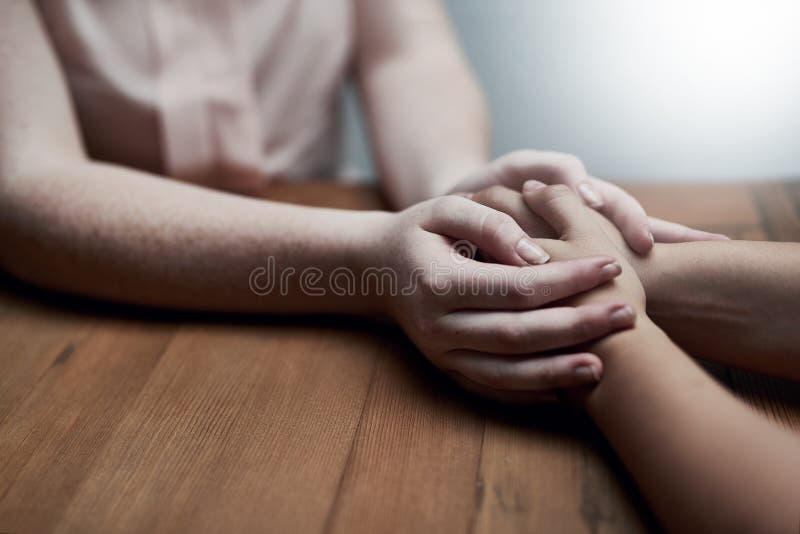 Youll always Have My Support. Shot of Two People Holding Hands in ...