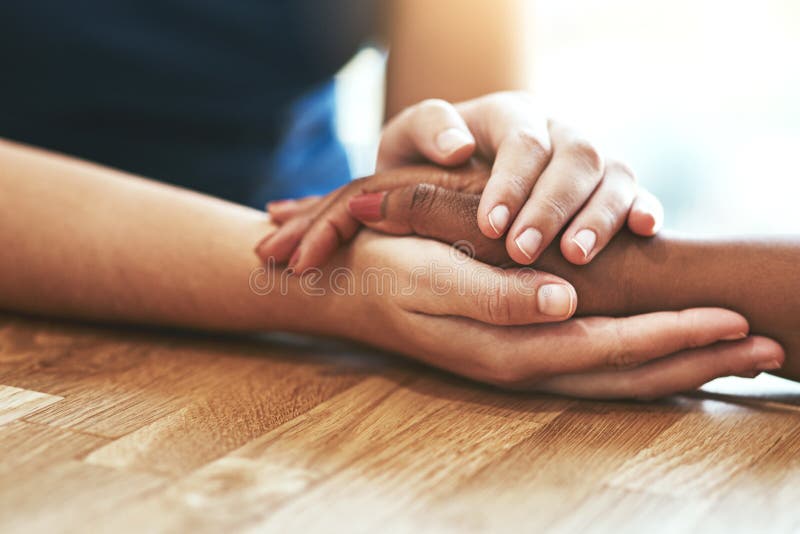 Youll Never Be Alone. Two People Holding Hands in Comfort. Stock Image ...