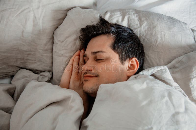 Yound Man Sleep in a Bed at Home. Stock Image - Image of people ...