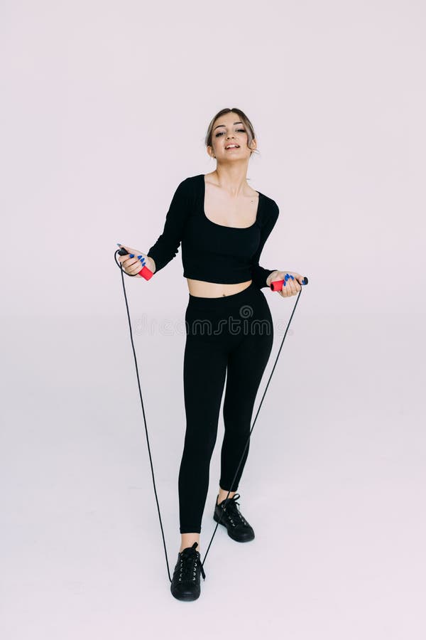 Young Woman with Rope is Training in Studio Stock Photo - Image of ...