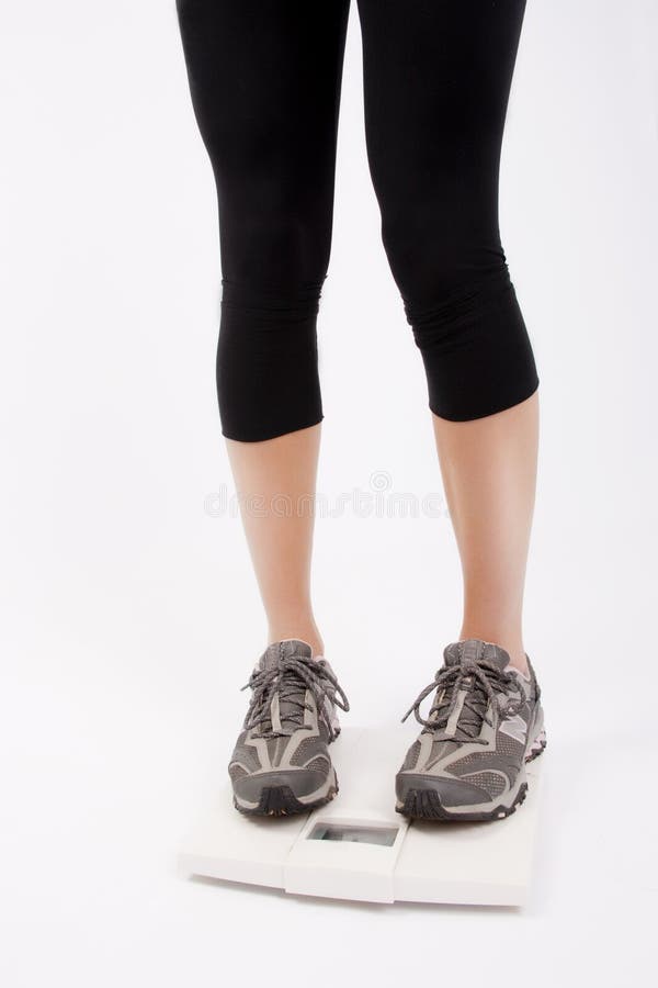 Young Active Woman Standing on Scale Stock Image - Image of concept ...
