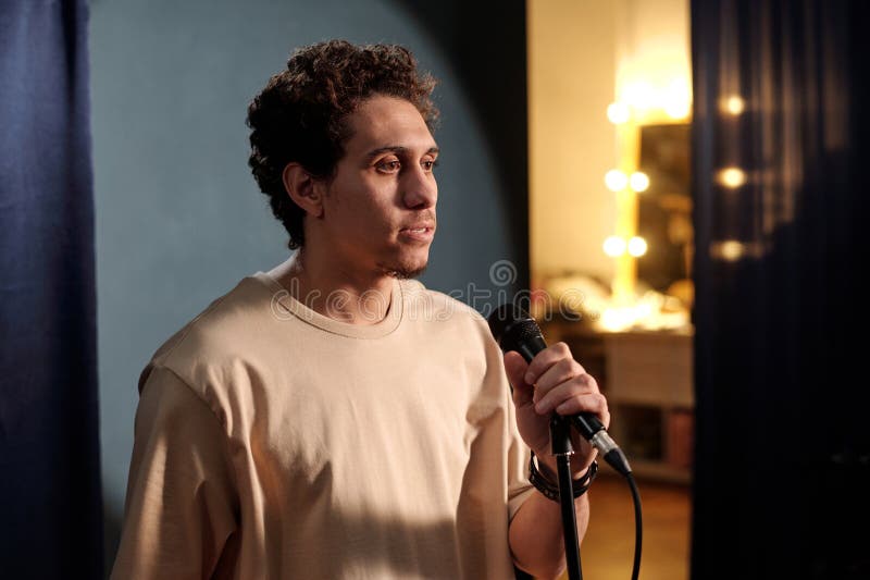 Young Actor Speaking in Microphone Stock Photo - Image of monologue ...
