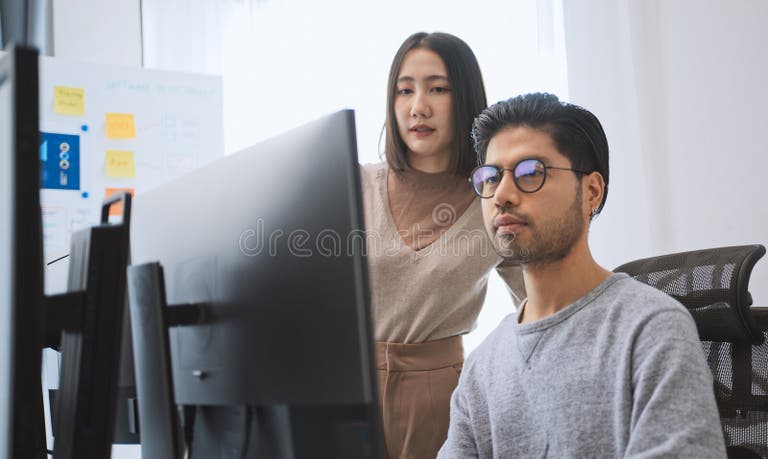 Young Adult Asian Male, Female Software Developer Coding Program on ...