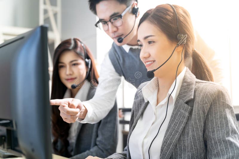 Supervisor Teach Employee by a Tablet. Stock Image - Image of hallway ...