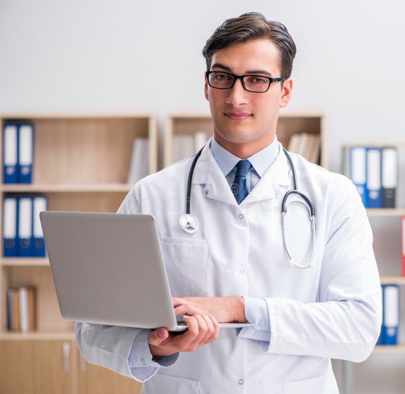 Young Adult Doctor with Laptop Computer Stock Image - Image of computer ...