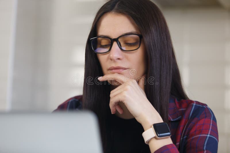Young Woman Solving Problems on Computer. Portrait of Focused White ...