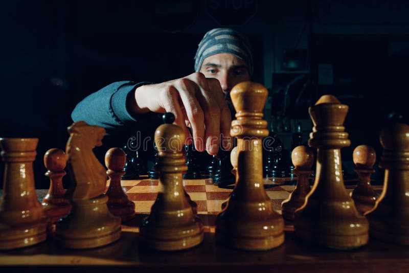 Young Adult Handsome Man Playing Chess in Dark with Side Lit Stock ...