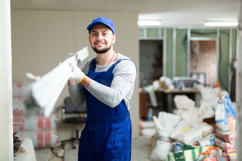 Worker Carrying Construction Materials at Renovating Object Stock Image ...