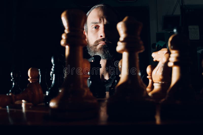 Young Adult Handsome Man Playing Chess in Dark with Side Lit Stock ...