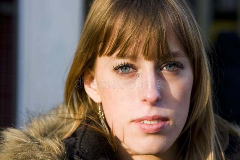 Young Adult Woman with Serious Expression Stock Photo - Image of ...