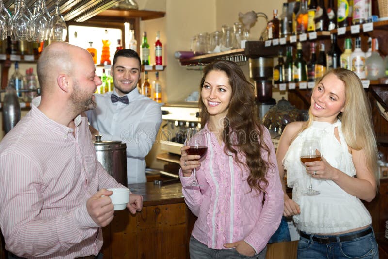 Young adults in bar stock photo. Image of female, girlfriend - 59271984