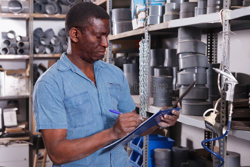 Young African American Male Making Inventory Stock Photo - Image of ...