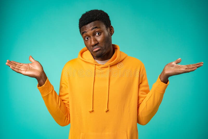 Young African American Man Wearing Casual Clothes Clueless And Confused