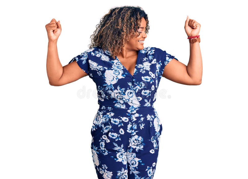 Young African American Plus Size Woman Wearing Casual Clothes Showing