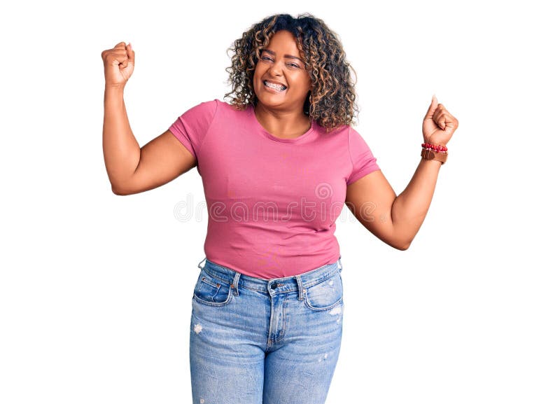Young African American Plus Size Woman Wearing Casual Clothes Showing