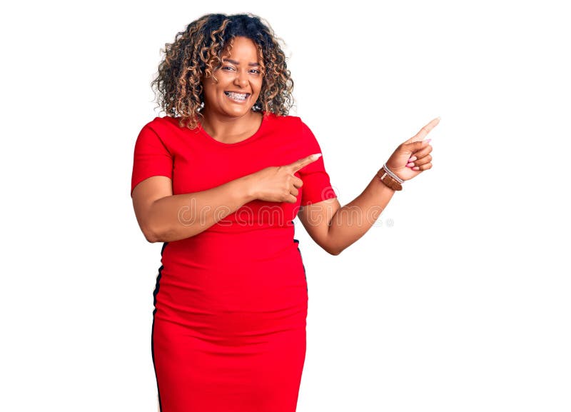 Young African American Plus Size Woman Wearing Casual Clothes Smiling