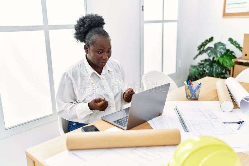 Young African American Woman Architect Having Video Call at ...