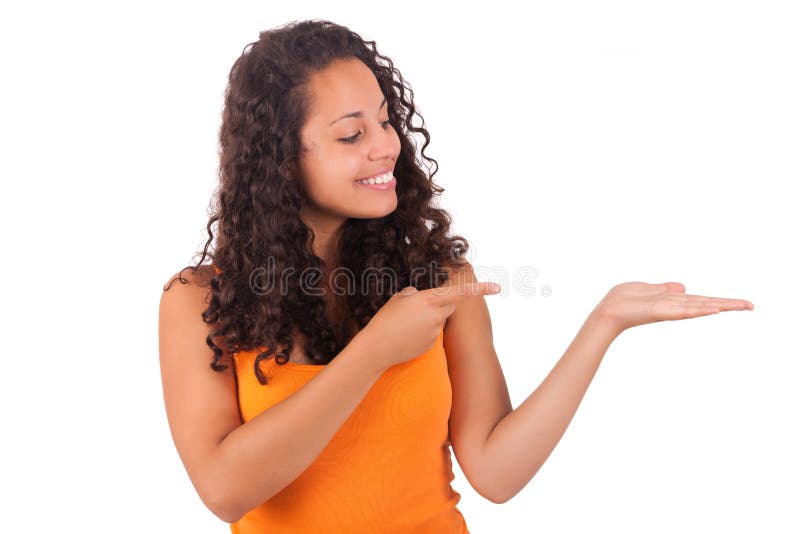 Young African American Woman Displaying Something Stock Photo - Image ...