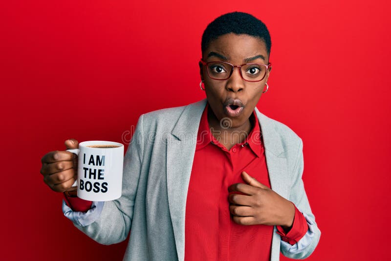 Young African American Woman Drinking From I Am The Boss Coffee Cup