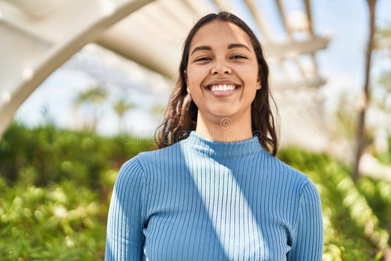 Young African American Woman Smiling Confident Standing at Park Stock ... Young African American Woman Smiling Confident Standing at Park Stock ...
