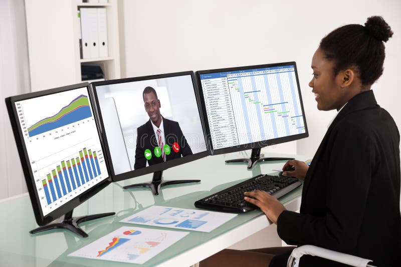 Businesswoman Working with Multiple Computer Stock Image - Image of ...